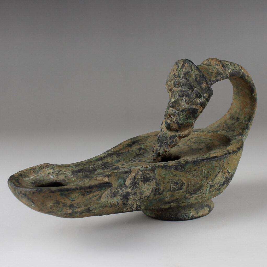 Roman oil lamp with theatre mask handle for sale | Roman Antiquities ...