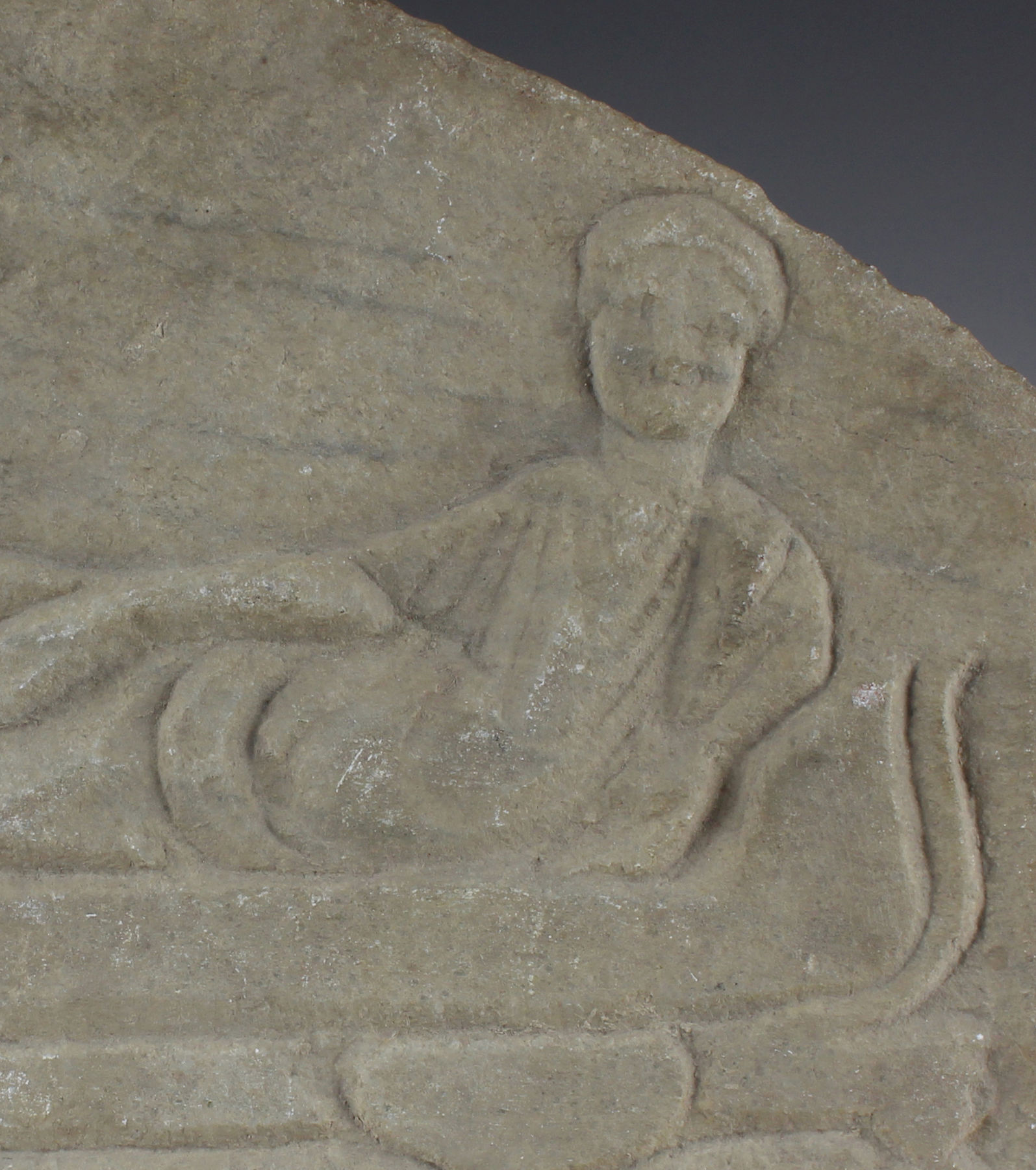 Roman funerary stele depicting a symposium with Greek inscription ...